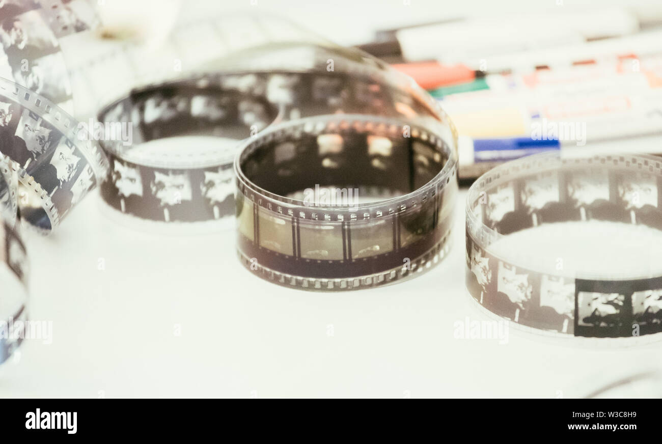 Filmstrip or film reel on a cutting table, vintage film production in ...