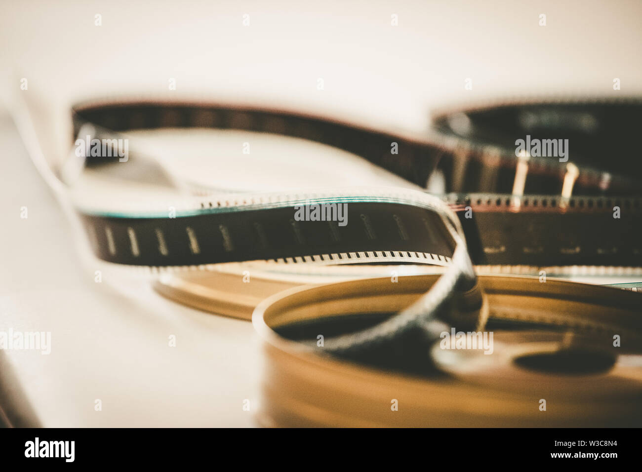 Filmstrip or film reel on a cutting table, vintage film production in ...