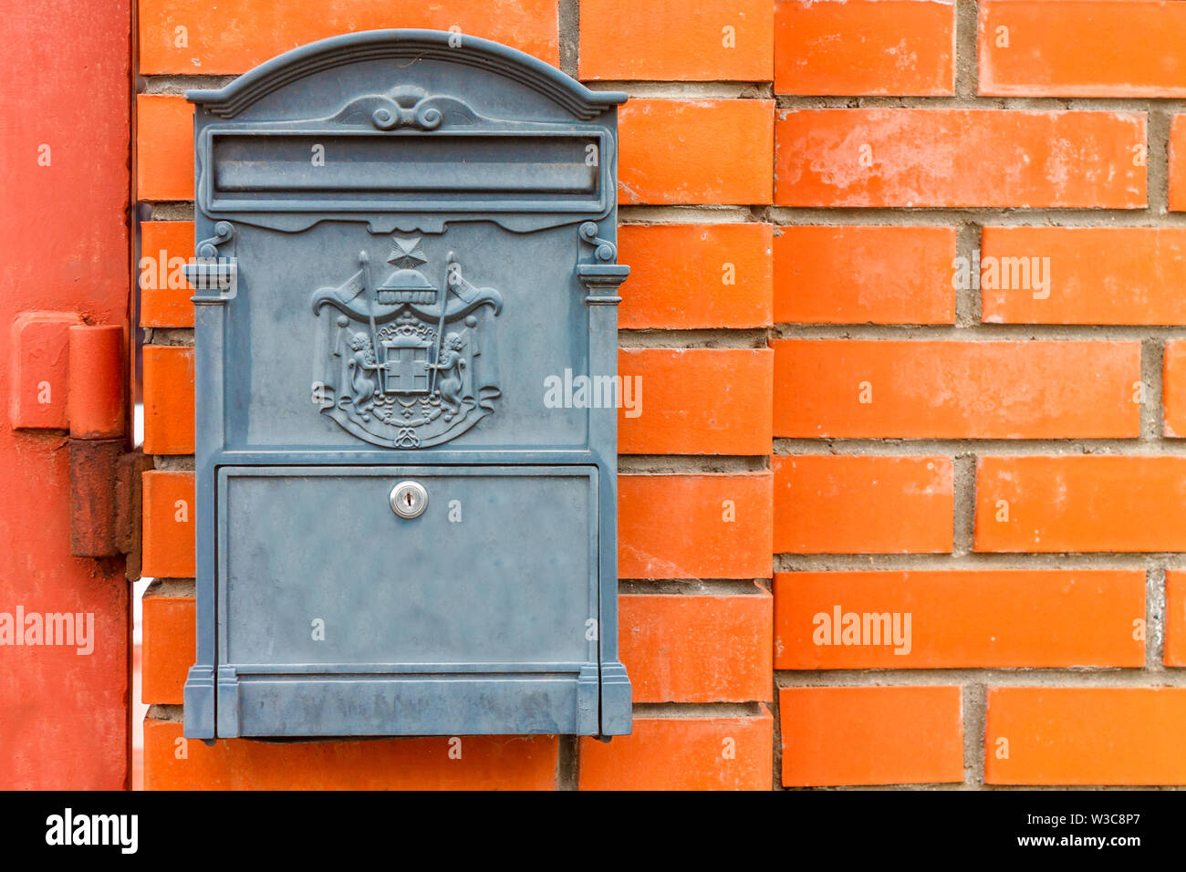 A beautiful mailbox hangs waiting for newspapers, parcels and letters ...