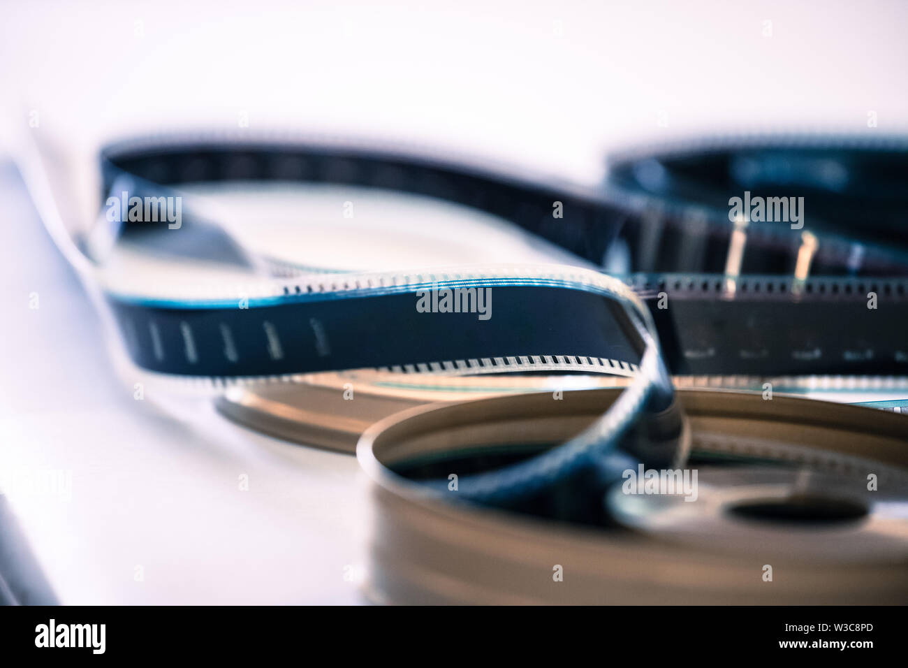 Filmstrip or film reel on a cutting table, vintage film production in ...