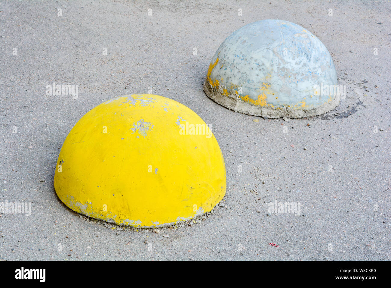 Element of sidewalk design and protection from car parking. Top view of ...