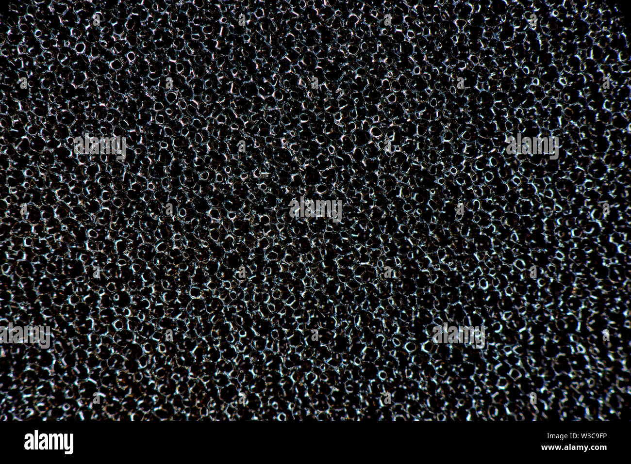 Background texture of black foam rubber Stock Photo - Alamy