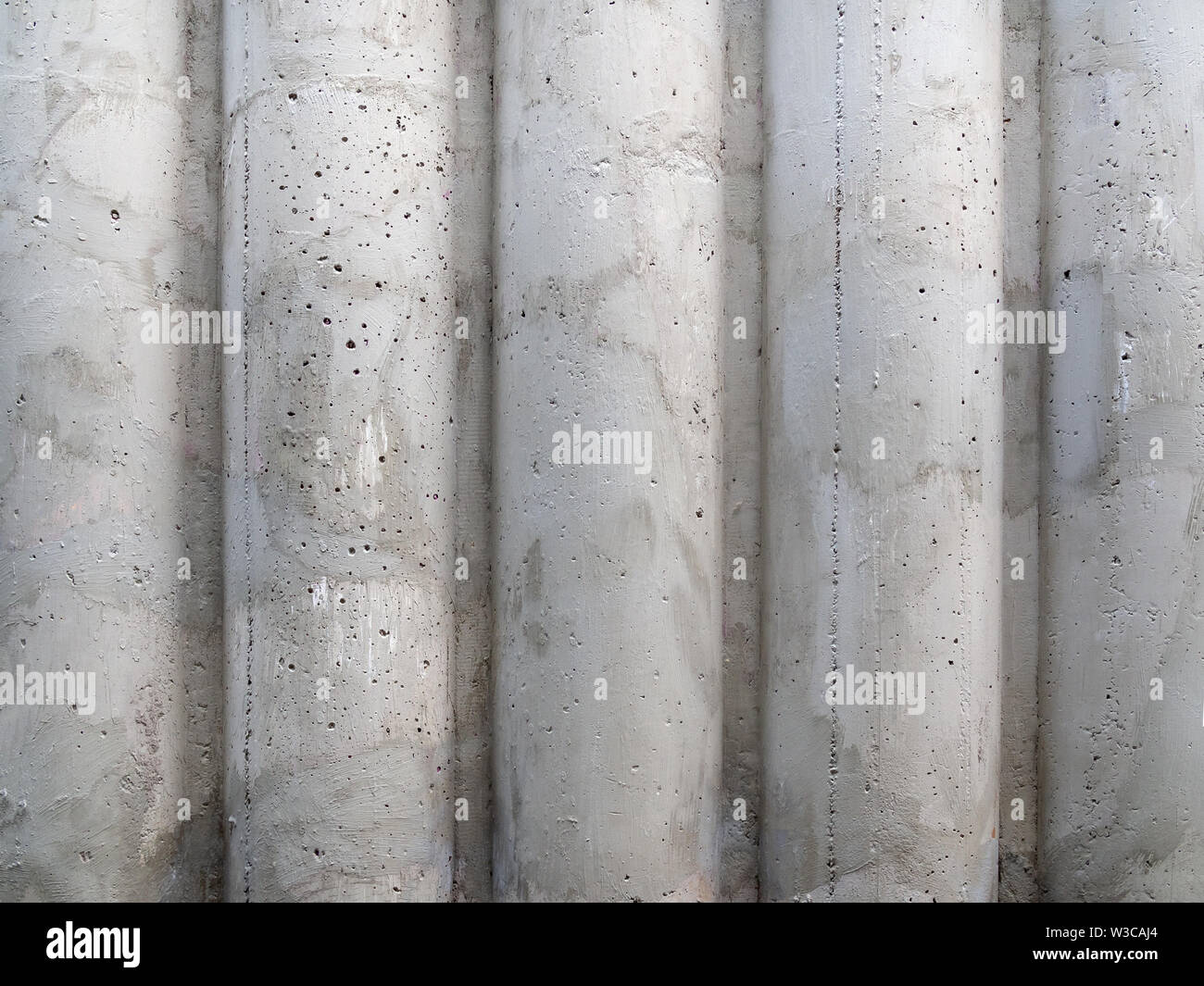 Concrete corrugated wall Stock Photo - Alamy