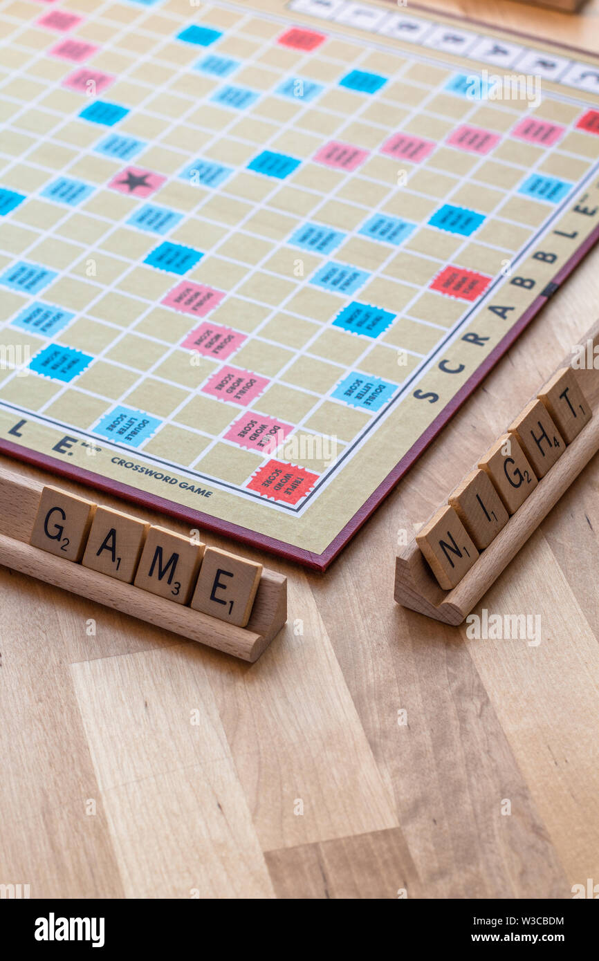 Scrabble board game with the scrabble tile spell "Game Night Stock ...