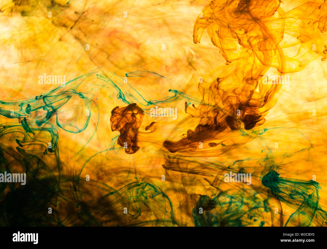 Acrylic colors and ink in water. Abstract background Stock Photo - Alamy