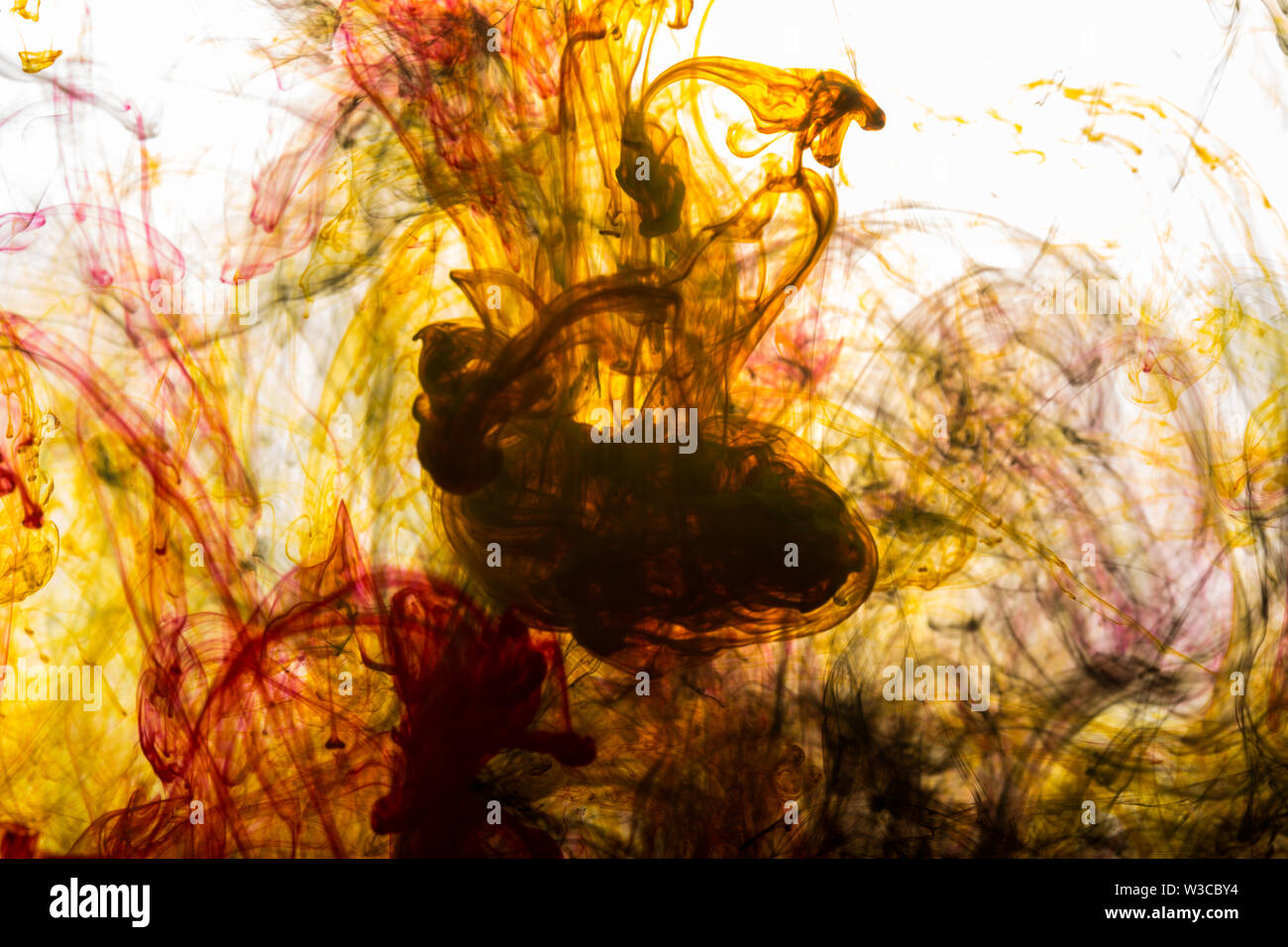 Acrylic colors and ink in water. Abstract background Stock Photo - Alamy