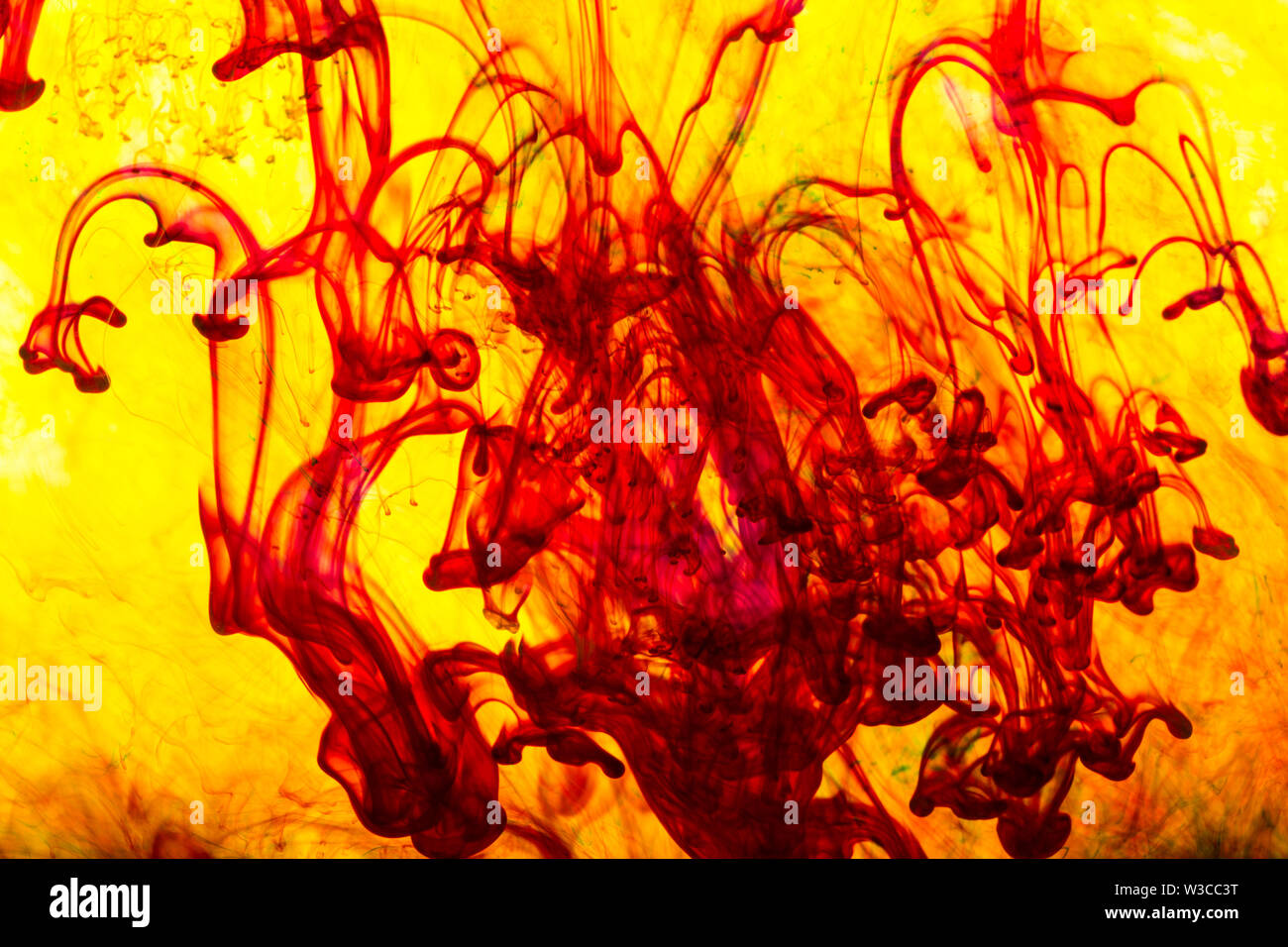 Acrylic colors and ink in water. Abstract background Stock Photo - Alamy