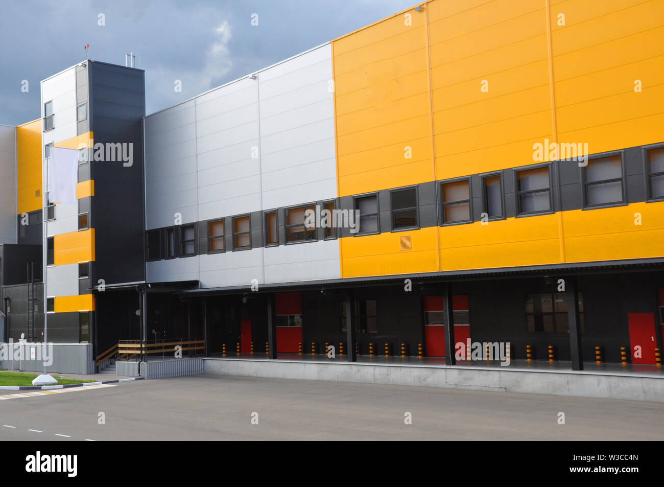 A Large distribution warehouse with gates for loading goods Stock Photo ...