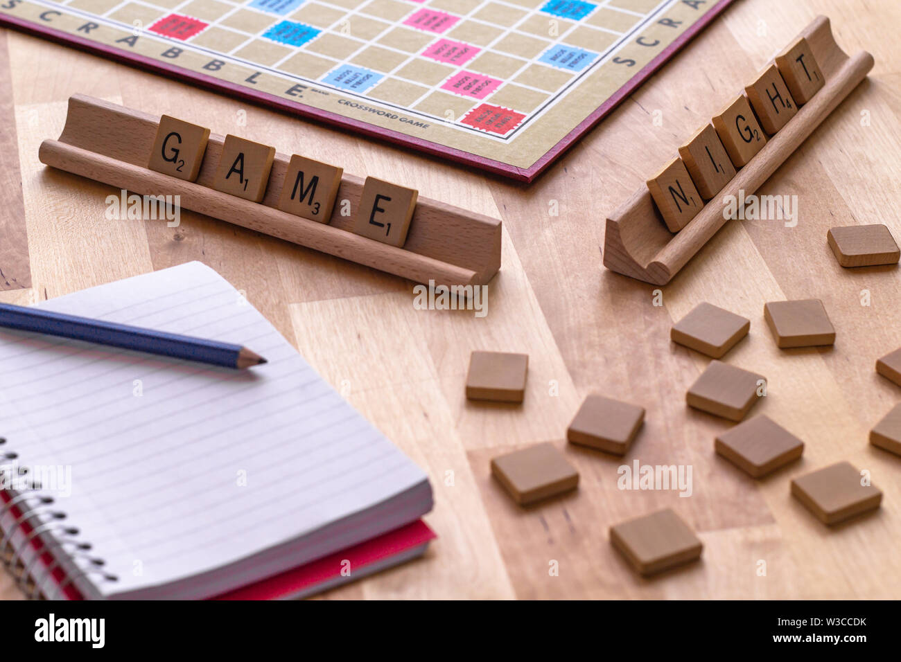 Scrabble board game with the scrabble tile spell "Game Night Stock ...