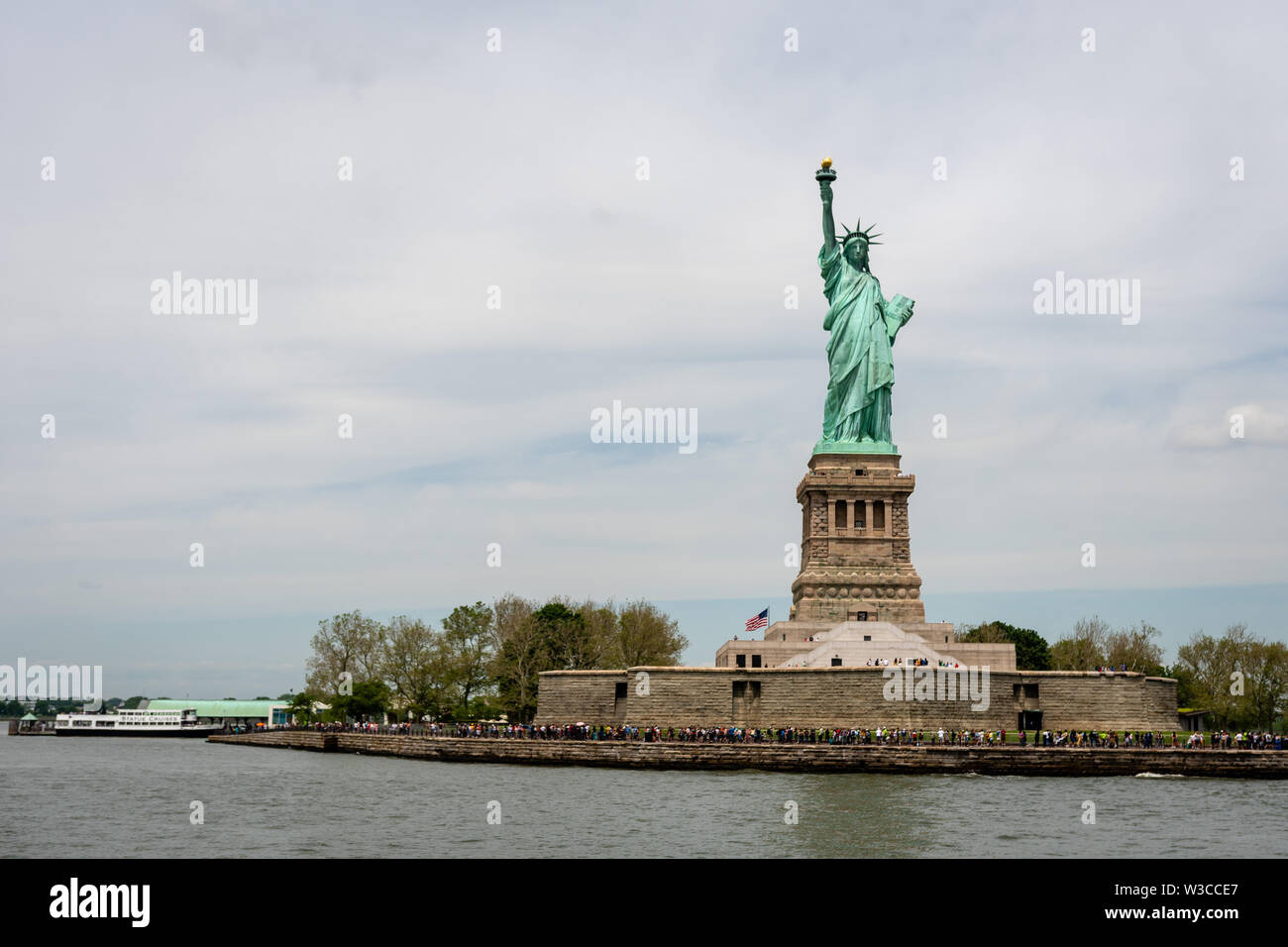 New York, USA - June 7, 2019: Ferry Boat approaching the Statue of ...