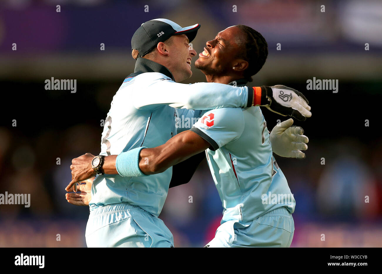 England's Jofra Archer (right) reacts with Jos Buttler after bowling ...