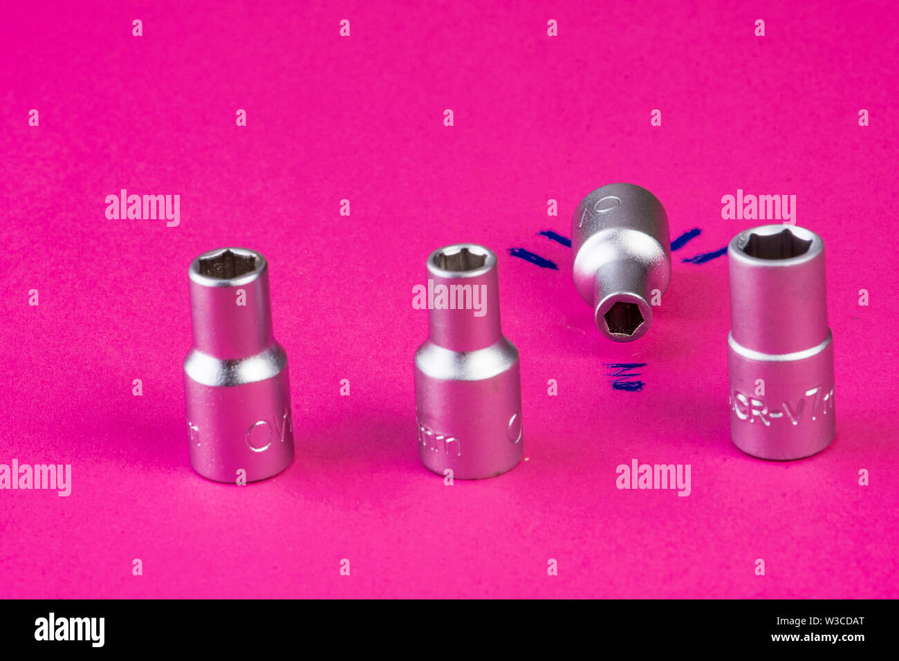 nut socket idea on pink Stock Photo - Alamy