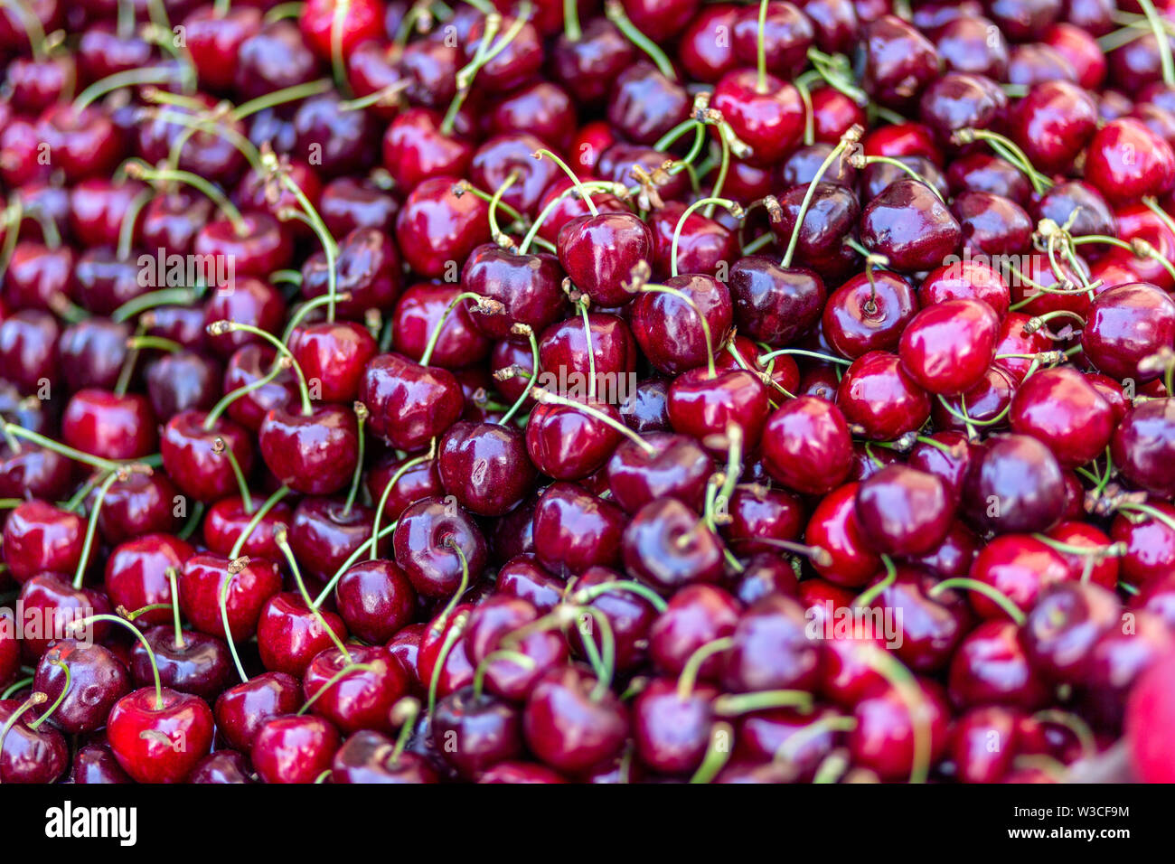 Cherries together hi-res stock photography and images - Alamy