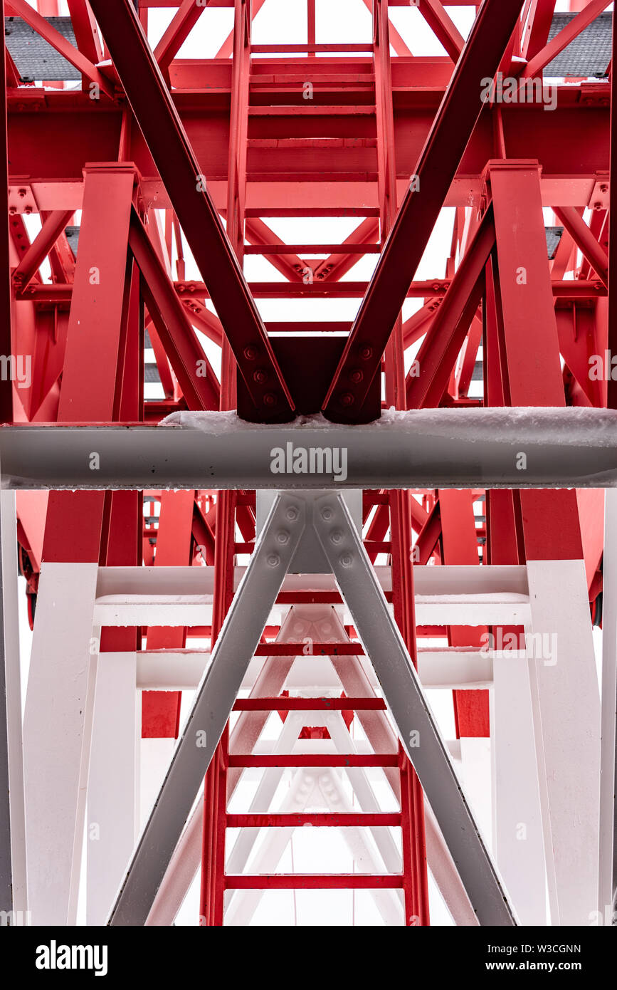 Pylon, red and white painted steel tower. The fragments showing the ...