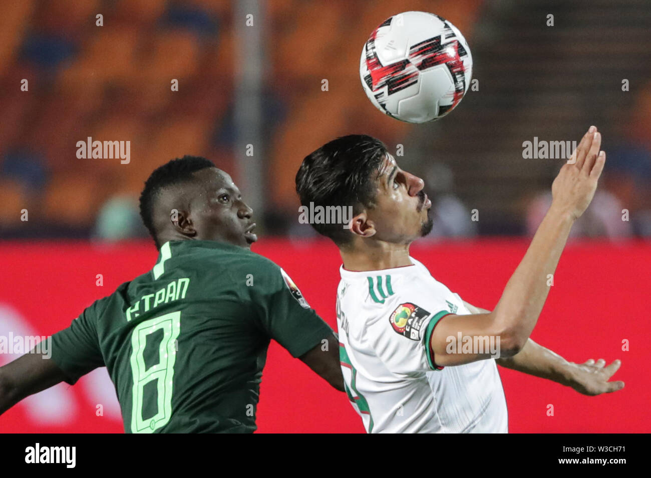 Cairo, Egypt. 14th July, 2019. Algeria's Baghdad Bounedjah (R) and ...