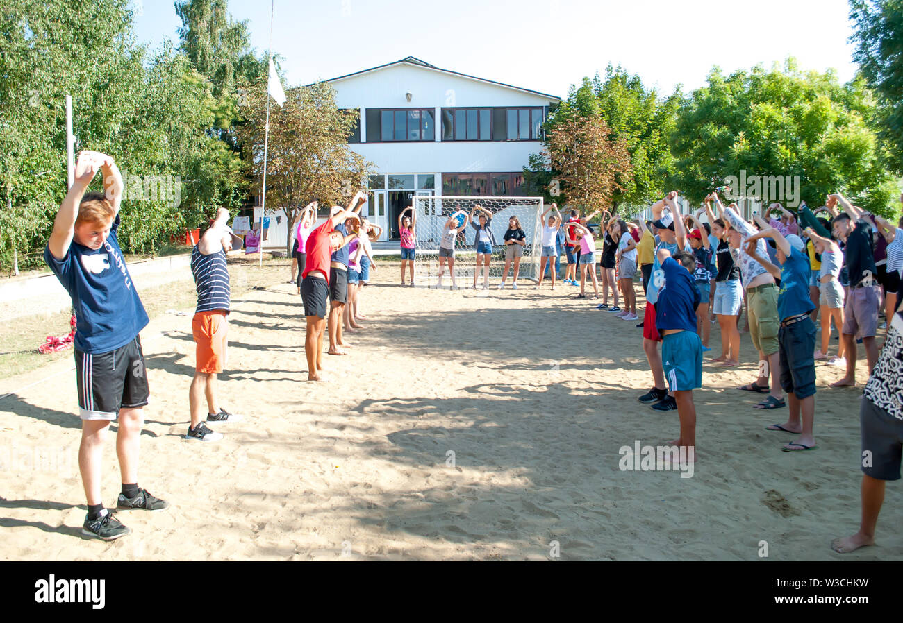 Odesa rgn. Ukraine, August 3, 2018: Children doing morning exercises at ...