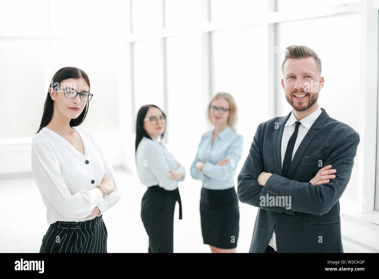 Successful employees standing in hi-res stock photography and images ...