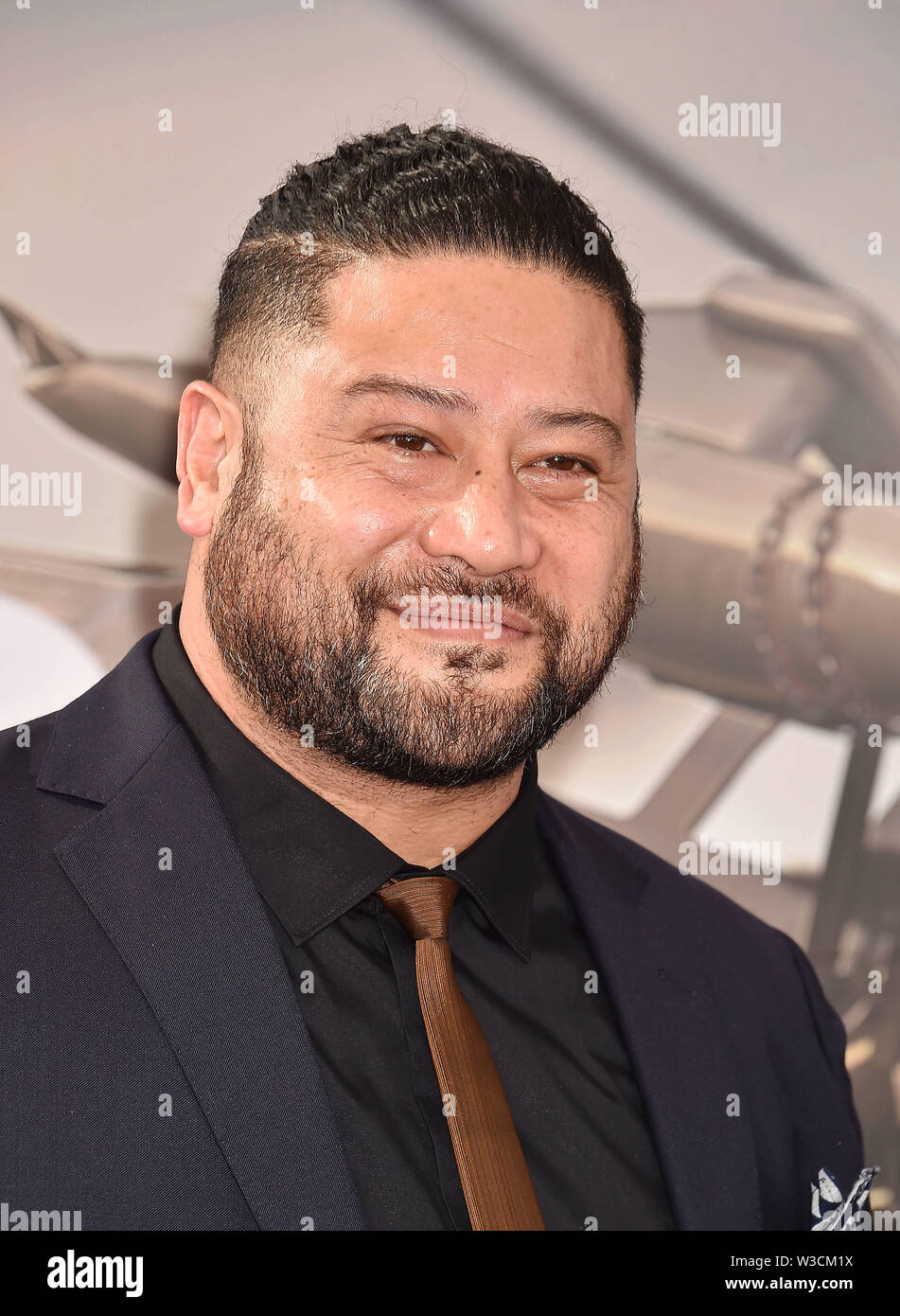 HOLLYWOOD, CA - JULY 13: John Tui attends the Premiere Of Universal ...