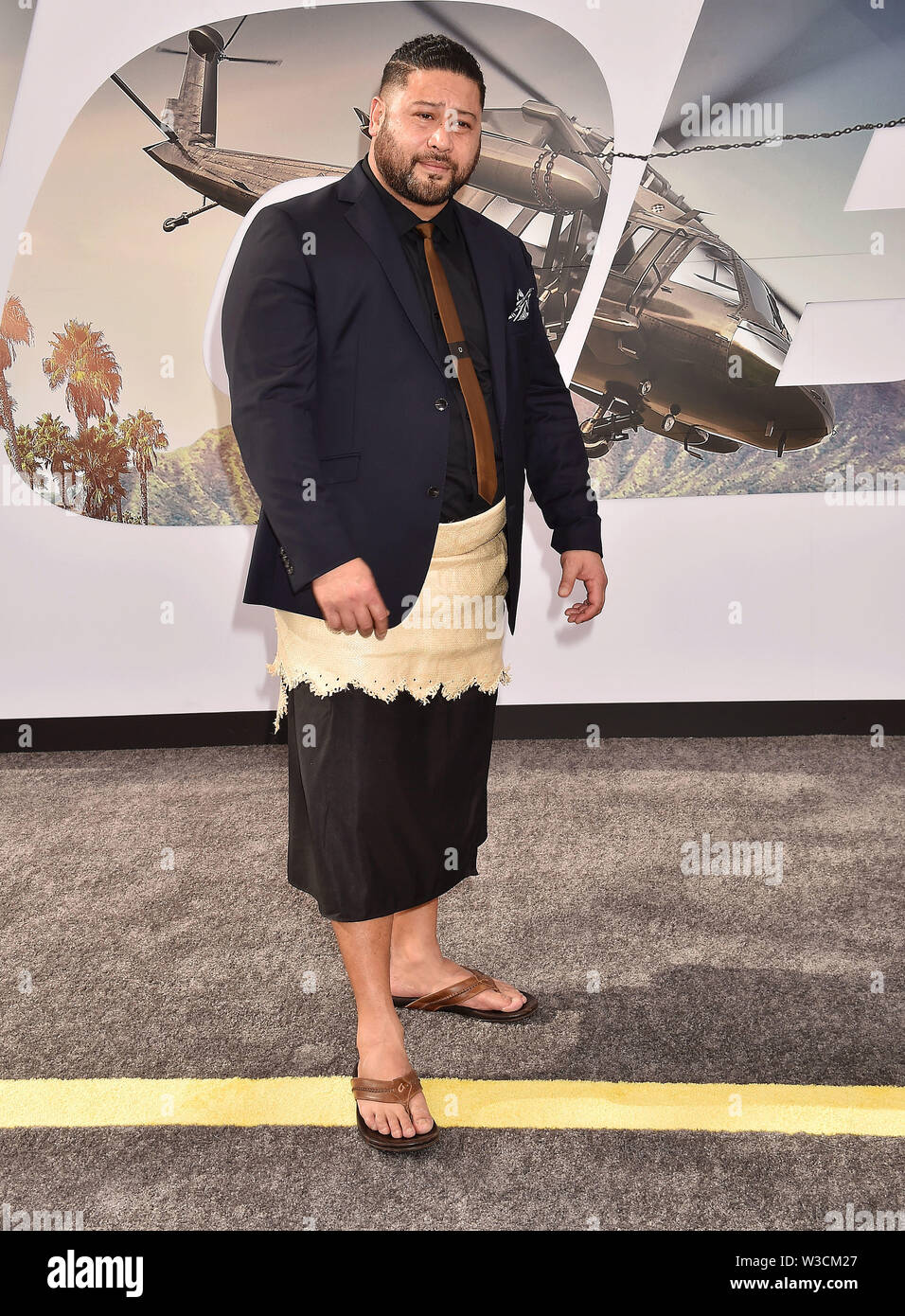 HOLLYWOOD, CA - JULY 13: John Tui attends the Premiere Of Universal ...
