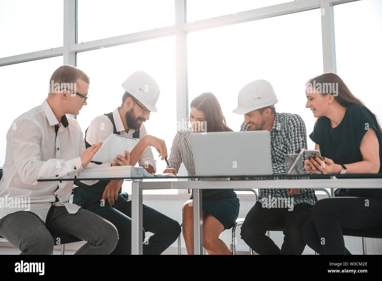 Architect client discussing plan blueprint hi-res stock photography and ...