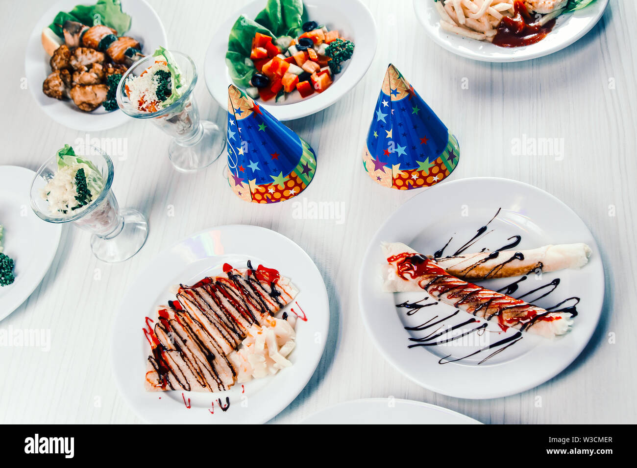 cheerful potato snacks and other festive dishes for children's feast ...