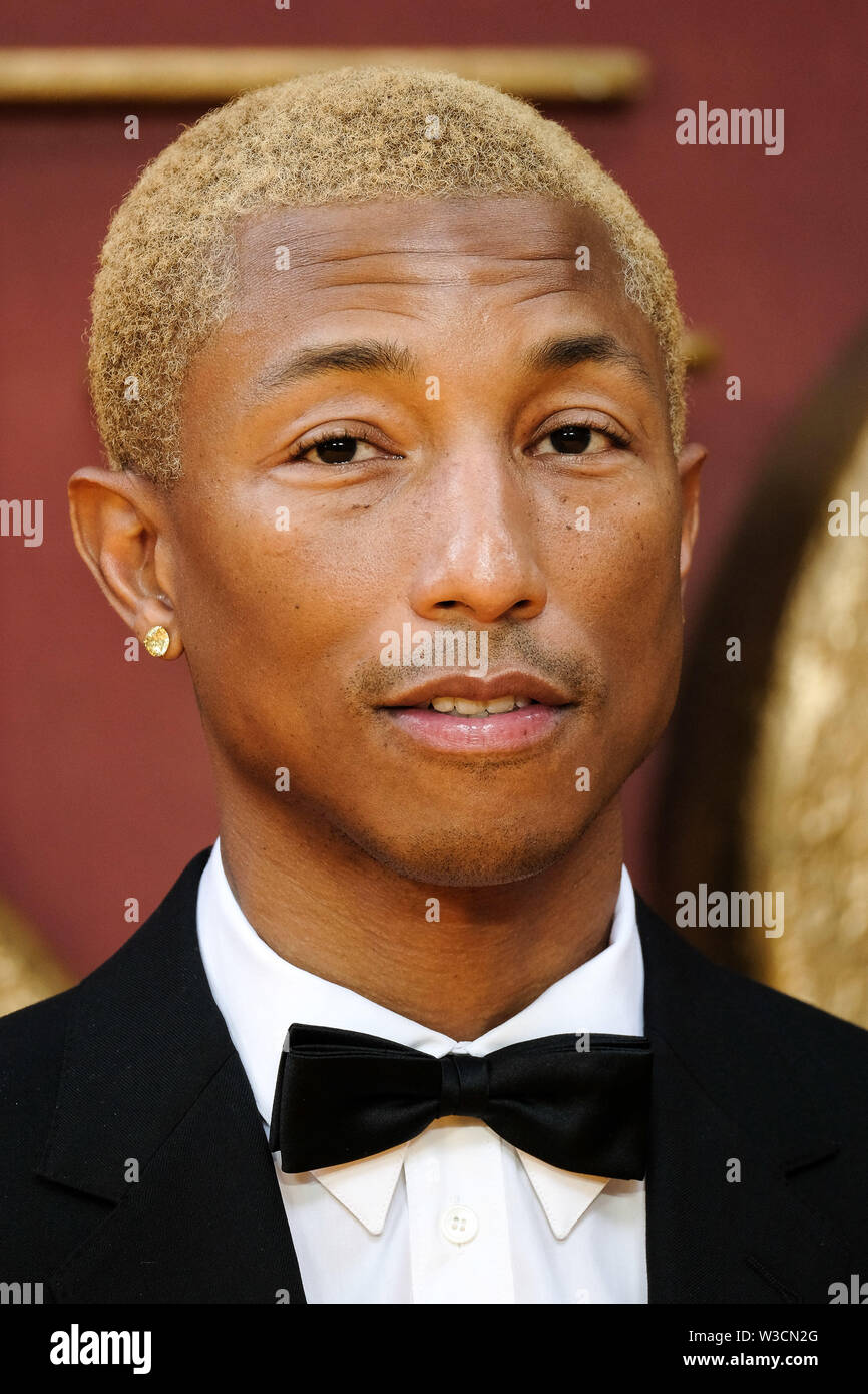 London, UK. 14th July 2019. Pharrell Williams poses on the yellow ...