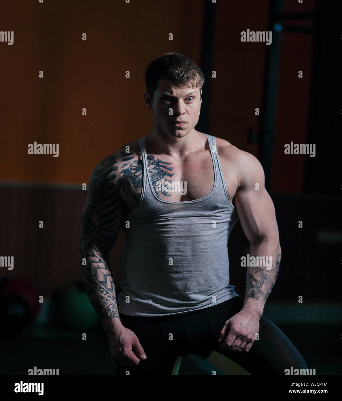 confident man bodybuilder in the gym.photo with copy space.sport and ...