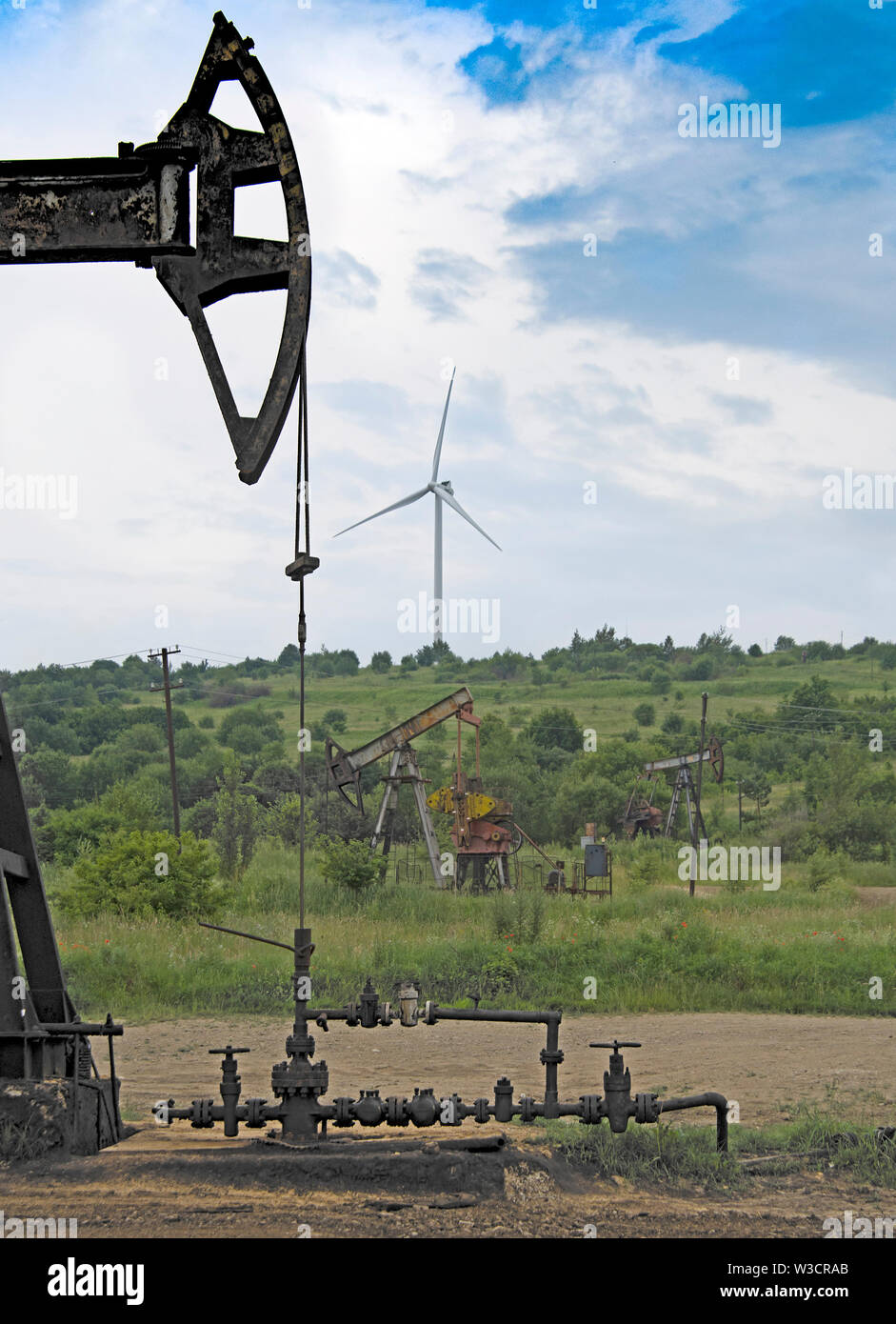 Wind turbine and oil rig hi-res stock photography and images - Alamy
