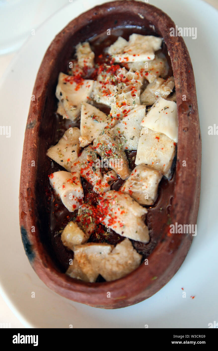 Delicious tripe with spices in the guvec (Turkish cuisine) on the ...