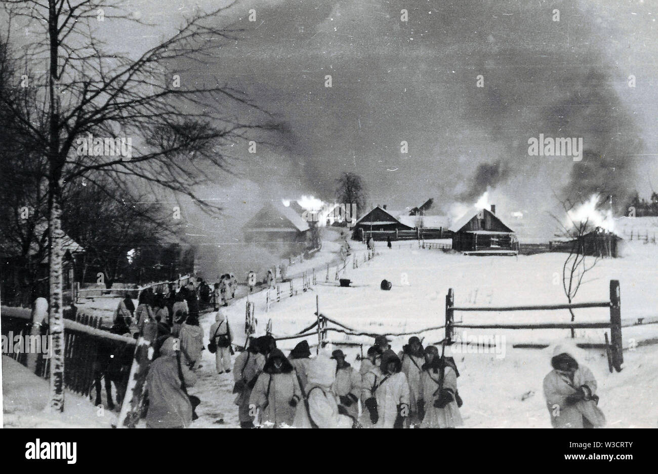 German Police Polizei Unit leaves a burning village in the Winter of ...