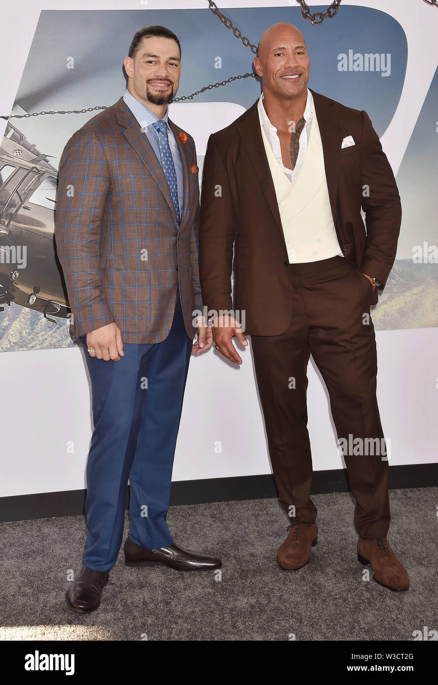HOLLYWOOD, CA - JULY 13: Roman Reigns (L) and Dwayne Johnson attend the ...