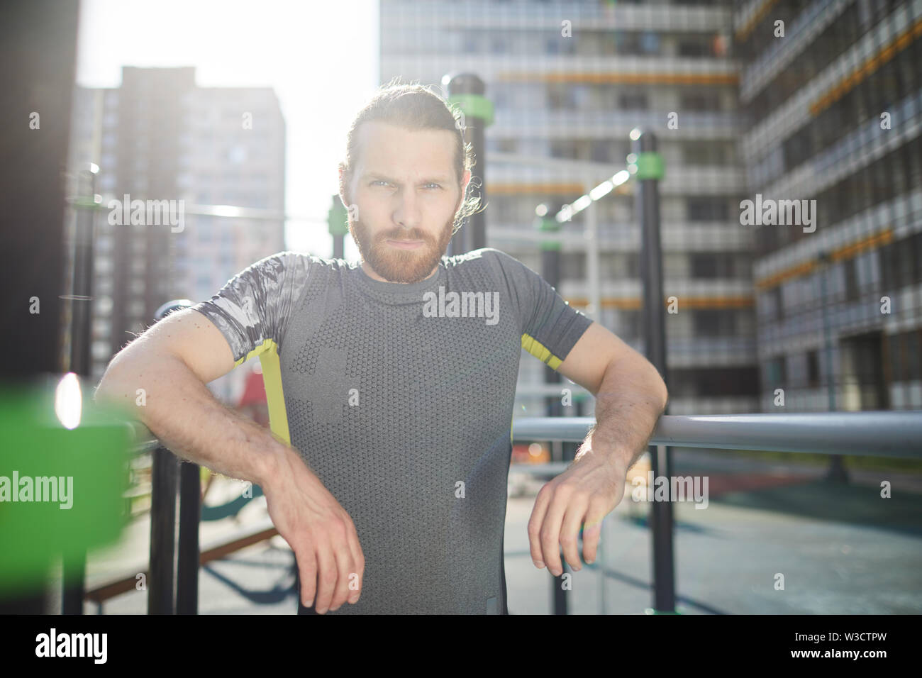 Portrait of serious determined handsome workout athlete with red beard ...