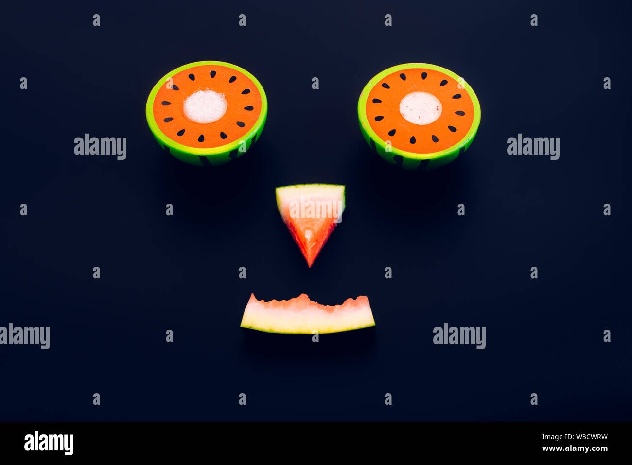 Smiling face made with pieces of fruit, like watermelon. Welcome to ...