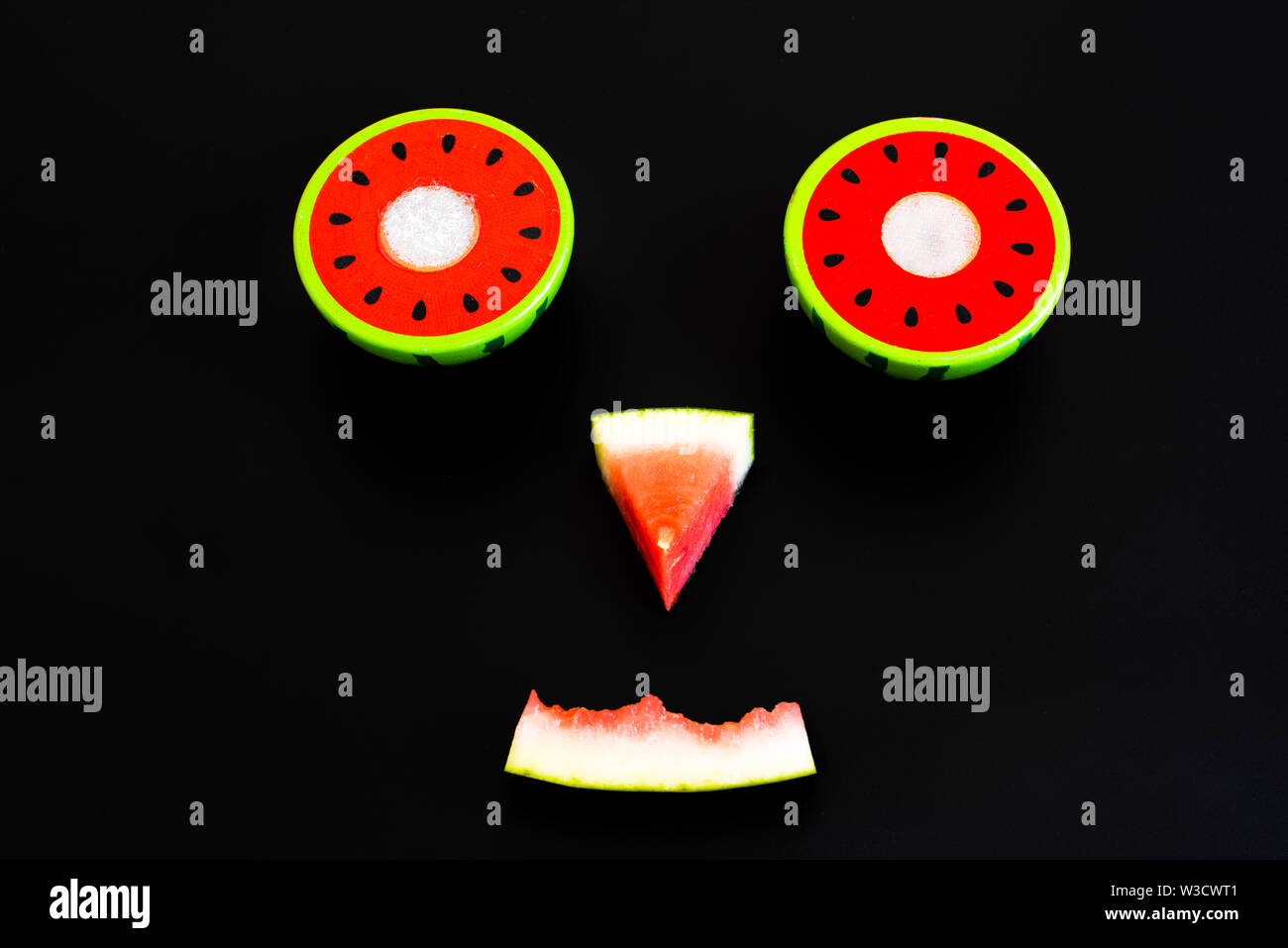 Composition of a funny face made with fruit, smile of a watermelon for ...