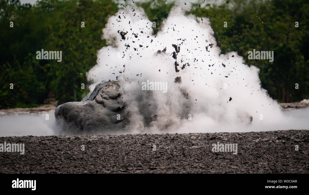 mud volcano with bursting bubble bledug kuwu. volcanic plateau with ...