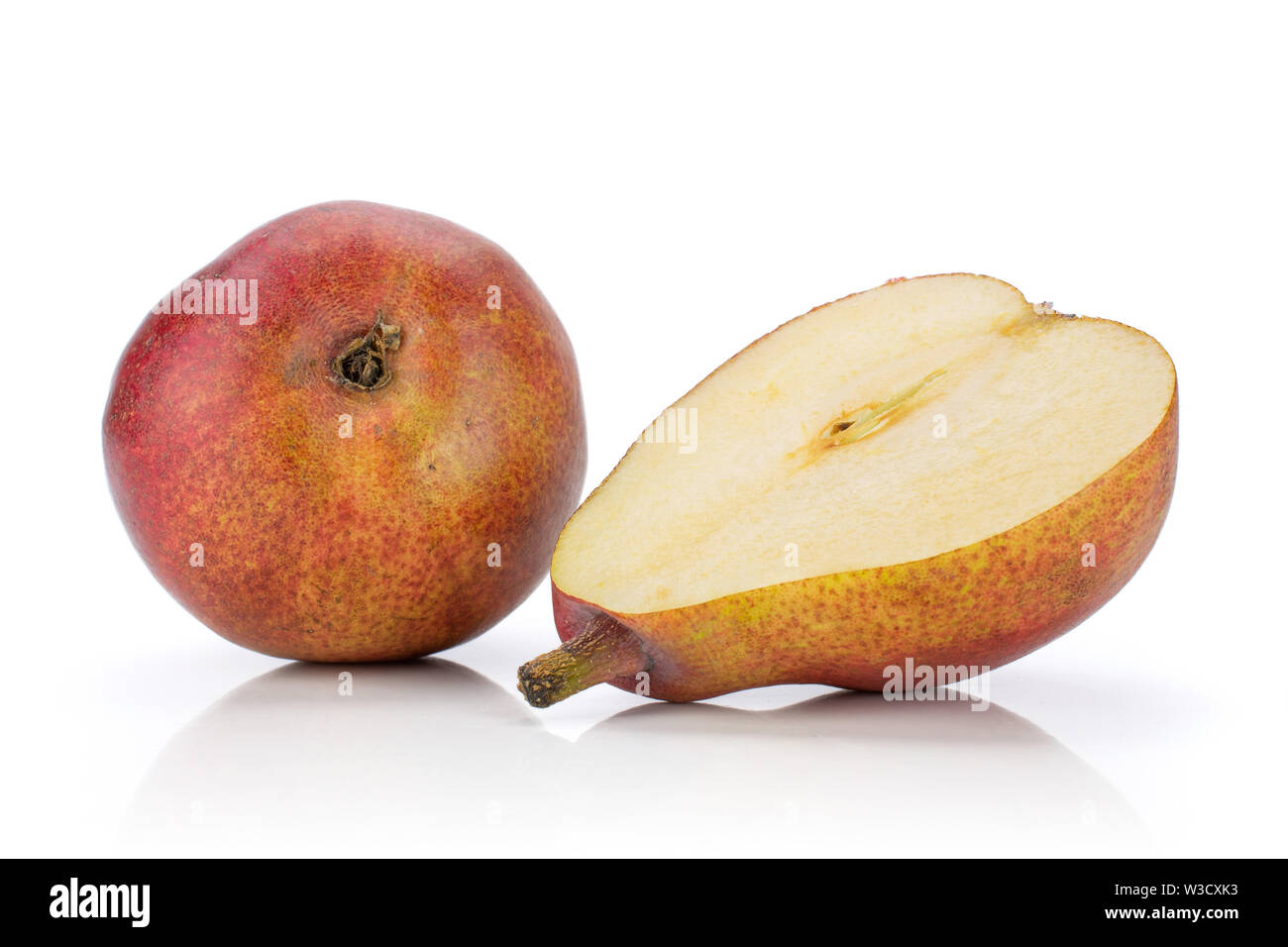 Group of one whole one half of fresh dark red pear anjou isolated on ...