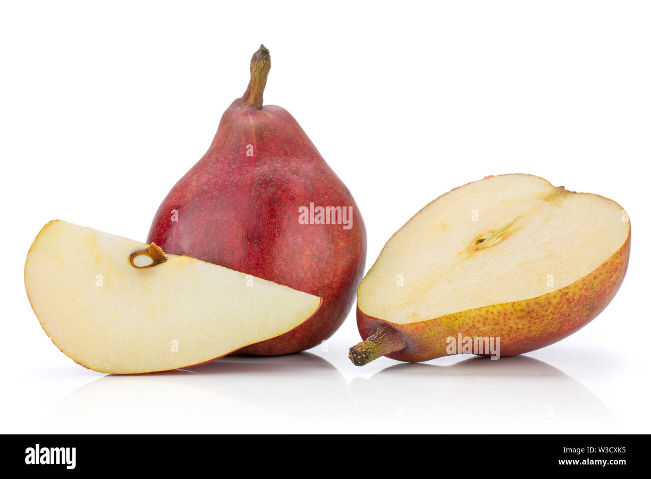 Group of one whole one half one slice of fresh dark red pear anjou ...
