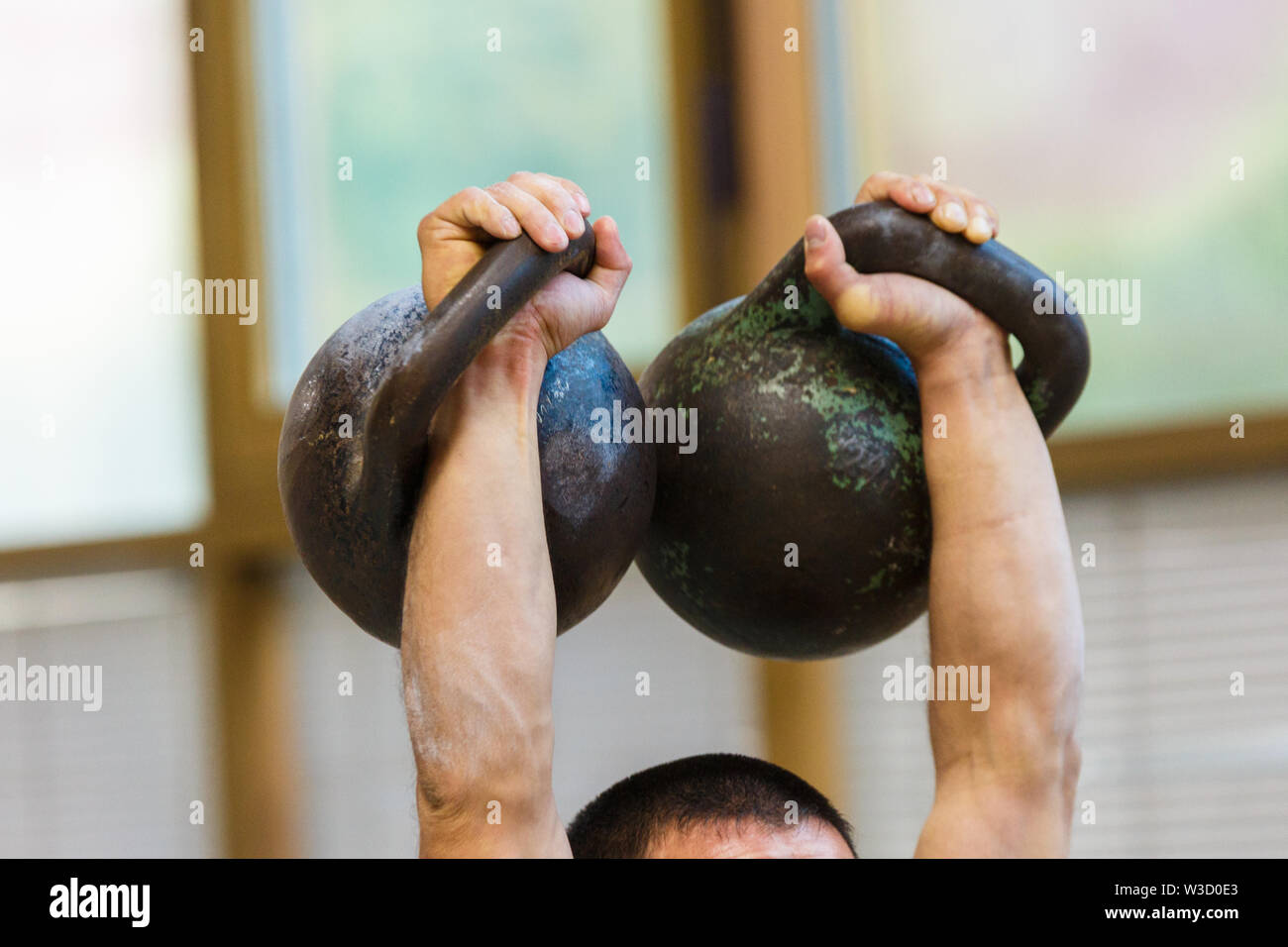 Athlete In Weight Lifting Two Weights Of 24 Kg Stock Photo Alamy athlete-in-weight-lifting-two-weights-of-24-kg-stock-photo-alamy