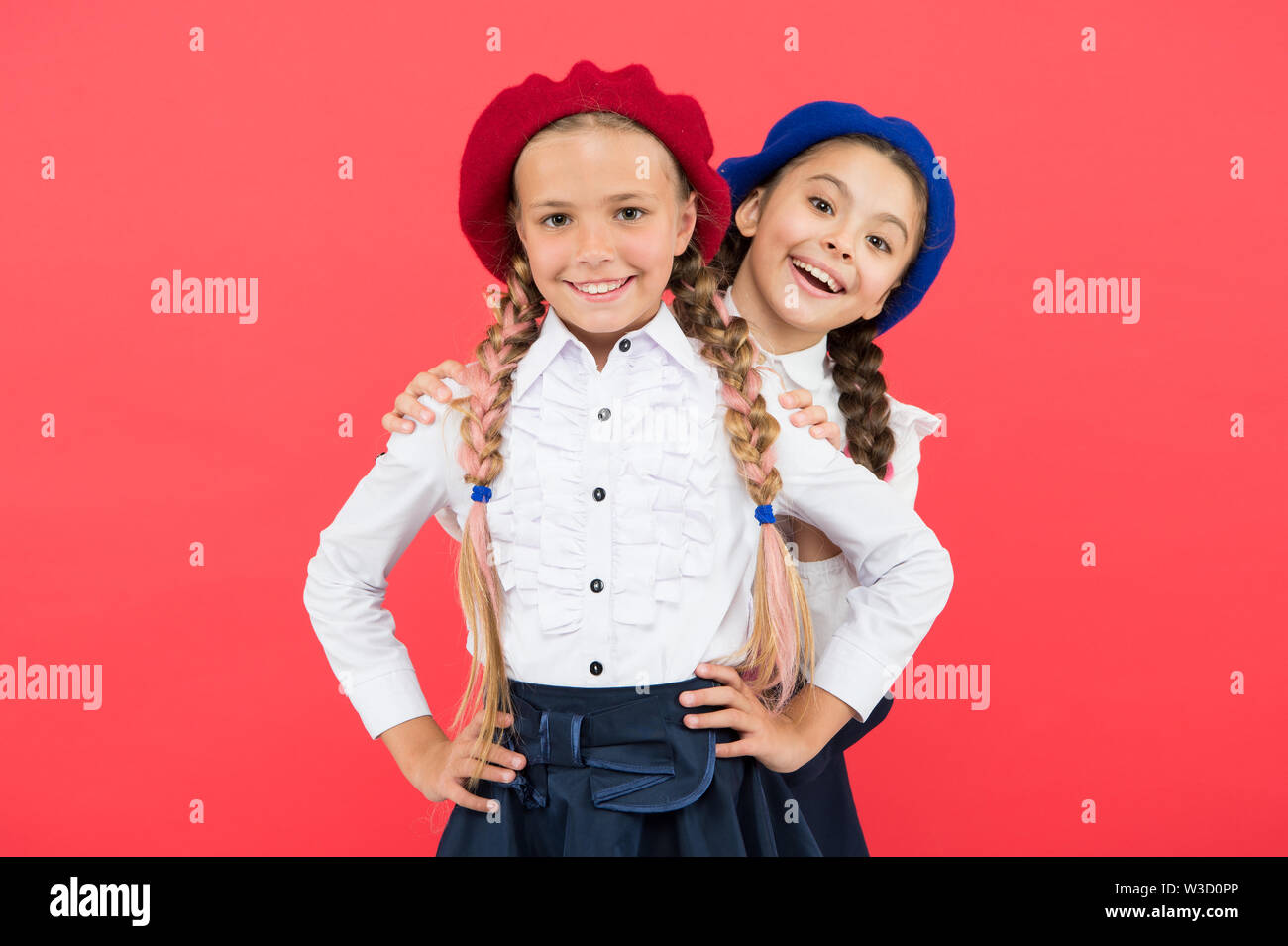 Girls best friends on red background. True friends always stand beside ...
