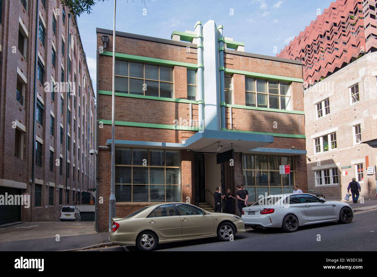 An almost square box shaped Art Deco featured two level office building ...