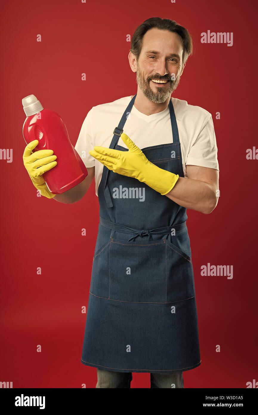 Cleaning day today. Bearded guy cleaning home. Cleanliness and order ...