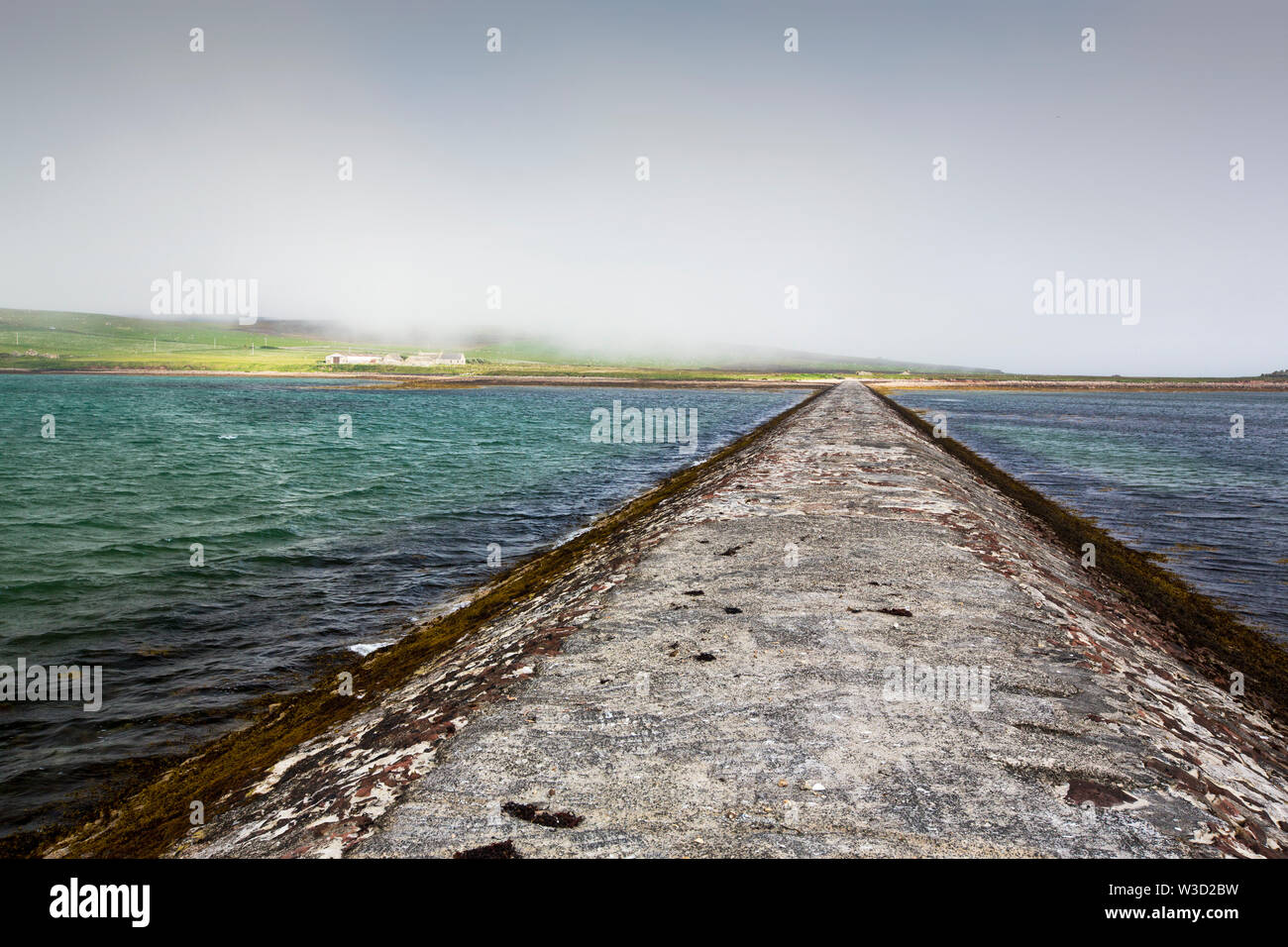 A causeway linking Hunda Island to Burray in the Orkneys, Scotland, UK ...