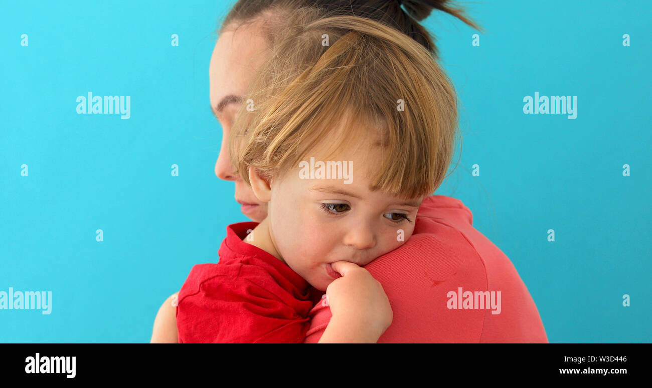 Mother hugging adorable little child Stock Photo - Alamy