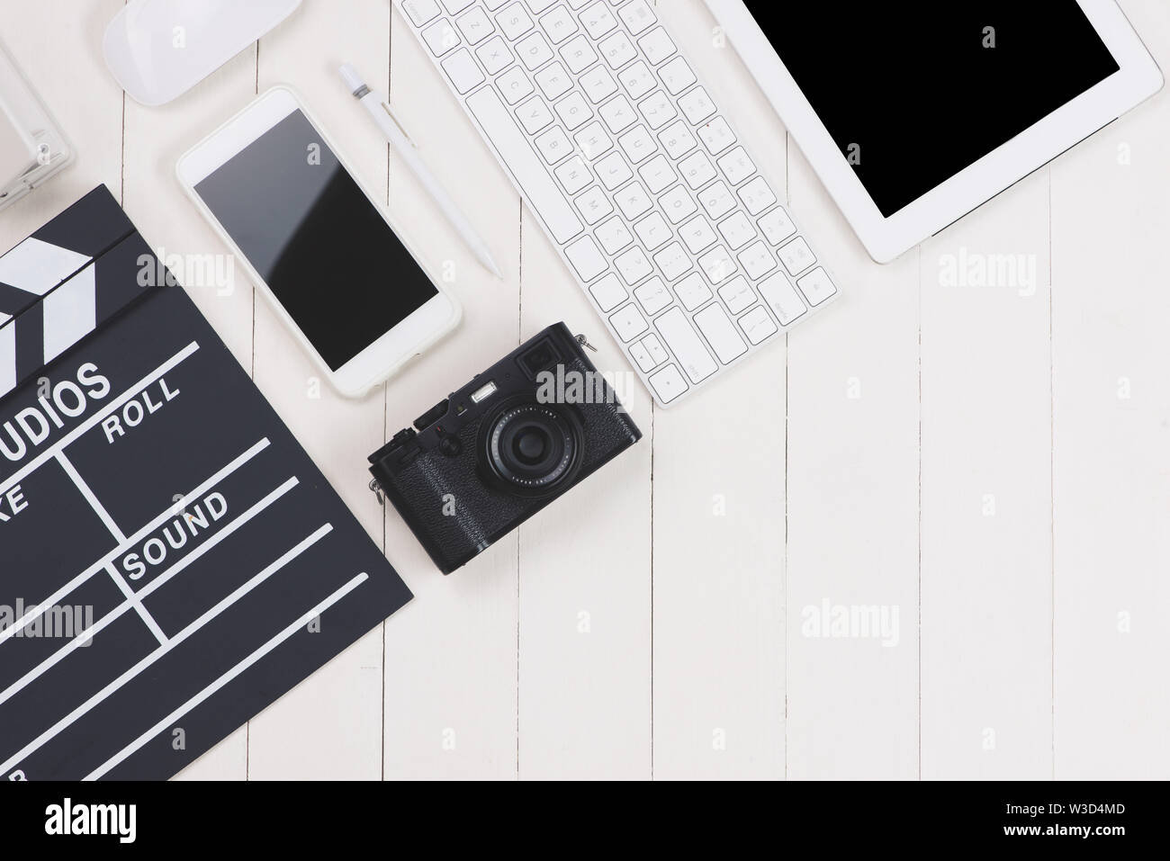 Film director desk with movie clapper board. Top view Stock Photo - Alamy