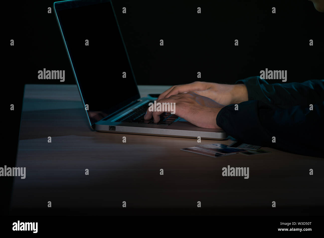 Man on computer dark room hi-res stock photography and images - Alamy