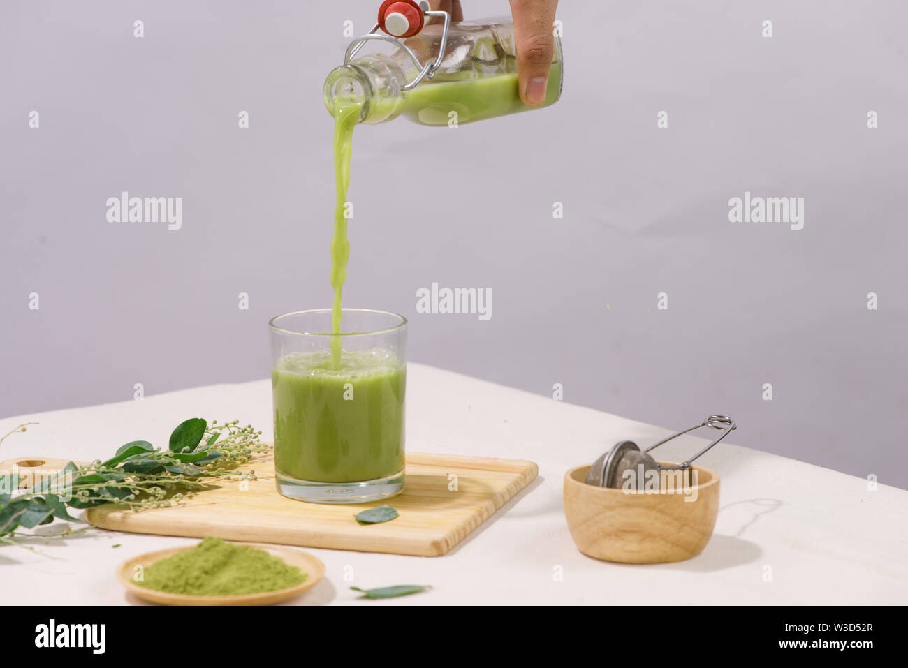 Tea being poured isolated hi-res stock photography and images - Alamy