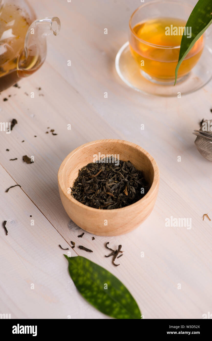 Dried tea leaves with tea pot Stock Photo - Alamy