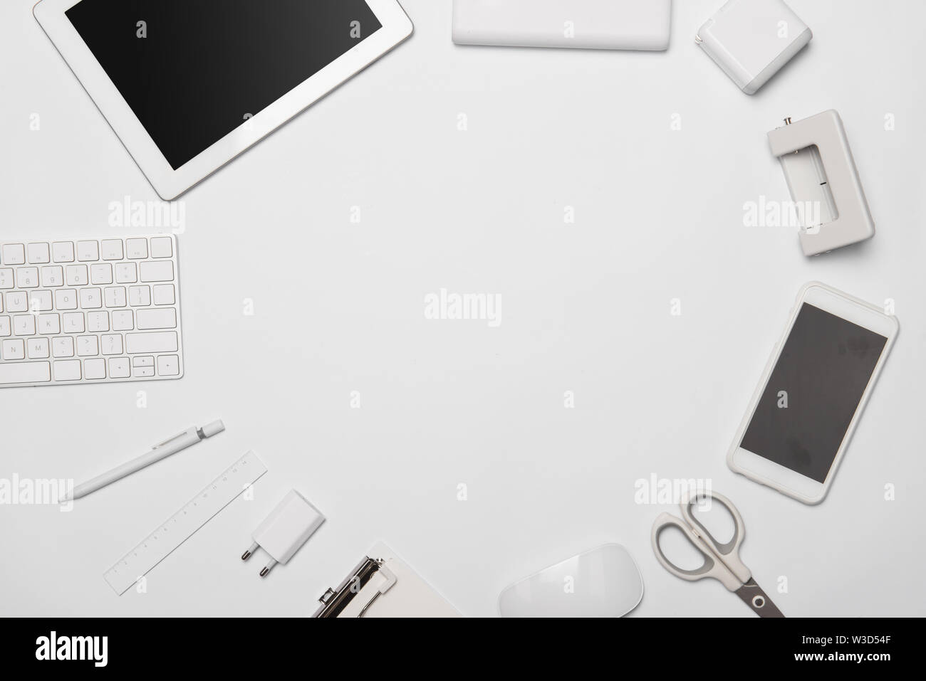 Top view of office and gadget supplies on white background Stock Photo ...