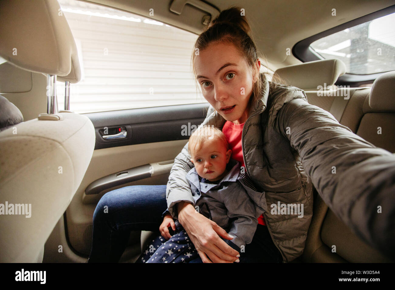 Car baby family hi-res stock photography and images - Alamy