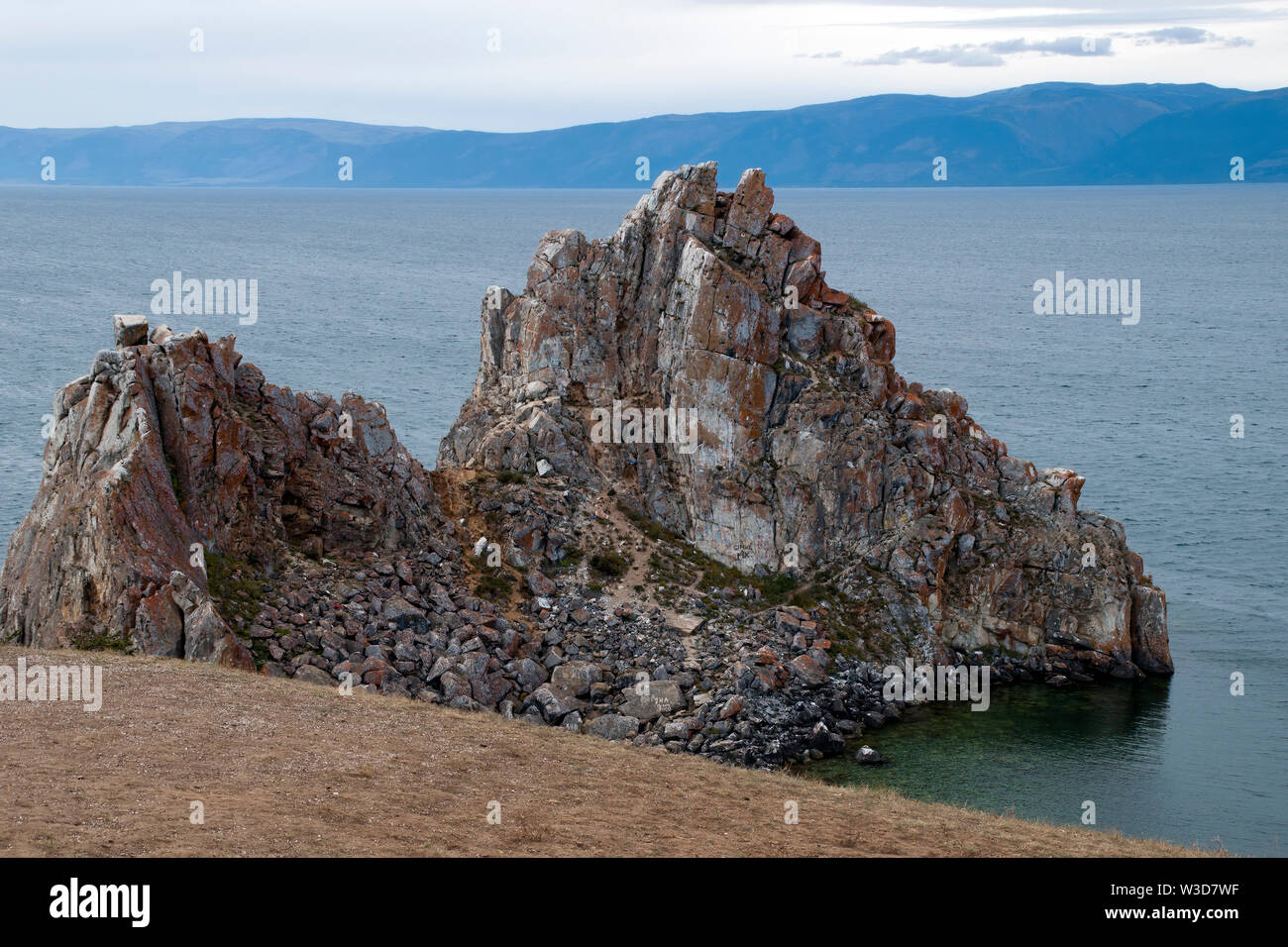 Khuzhir Russia, shaman rock on Olkhon Island with Lake Baikal in the ...